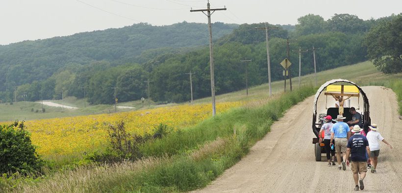 Iowa Catholics take items from closed churches on pilgrimage to new church