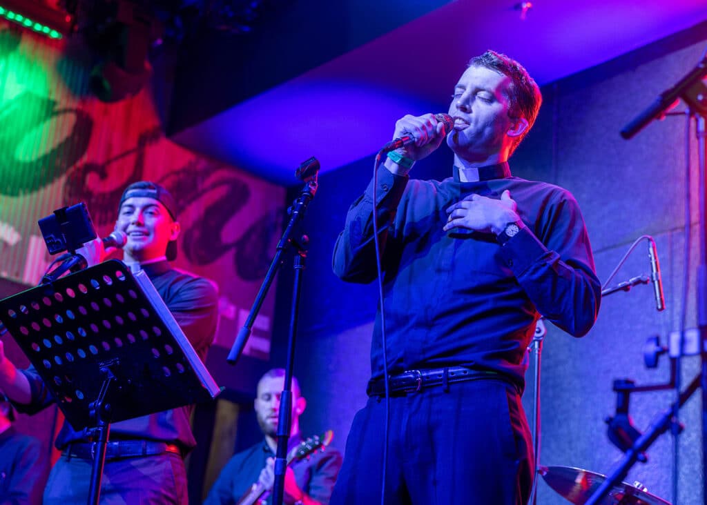 Priests band together to celebrate Virgin Mary with music